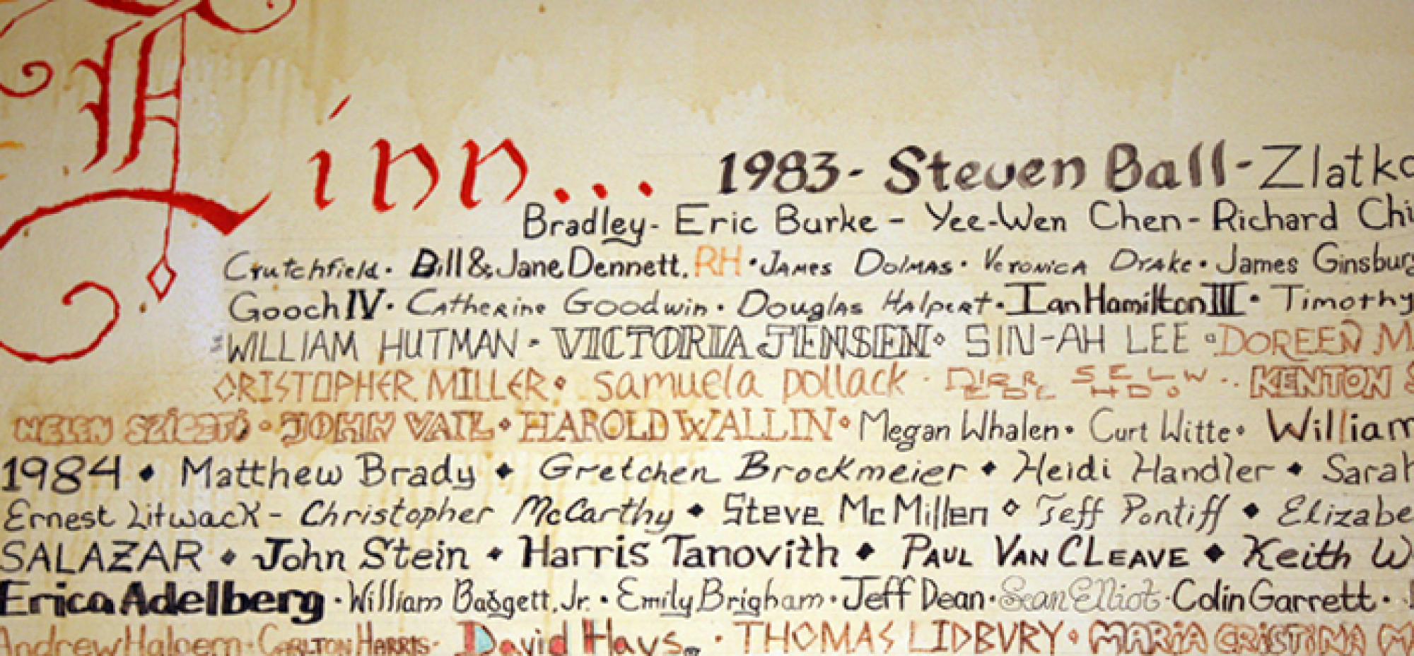 The writing is on the (Linn House) wall